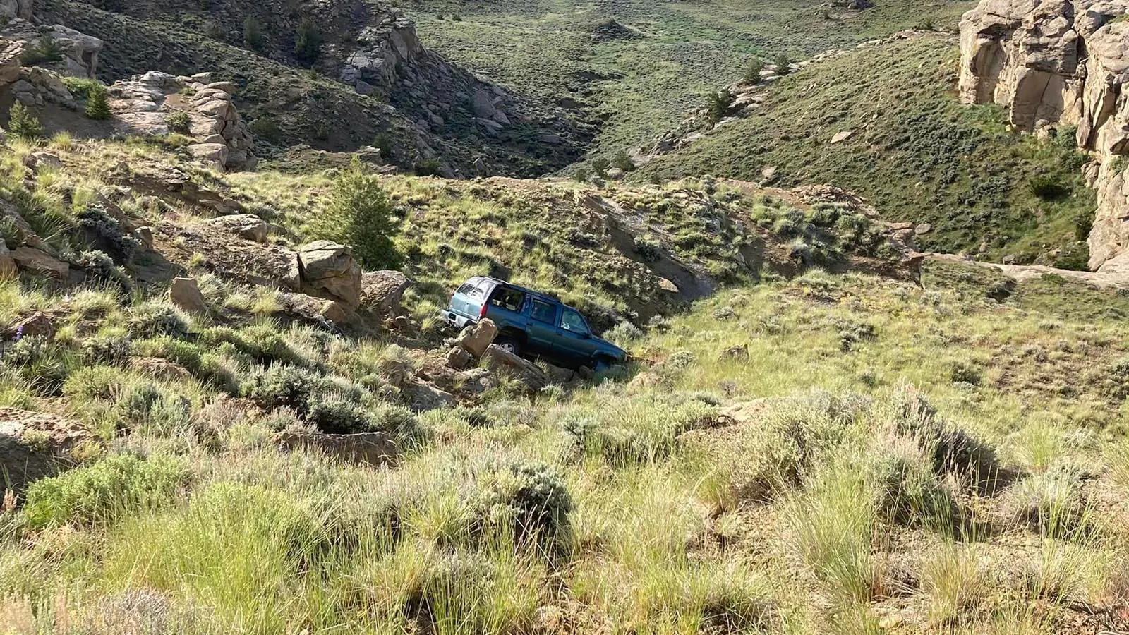 Woman Claims Carjackers Crashed Her SUV Off Highway; Cops Say She Was ...