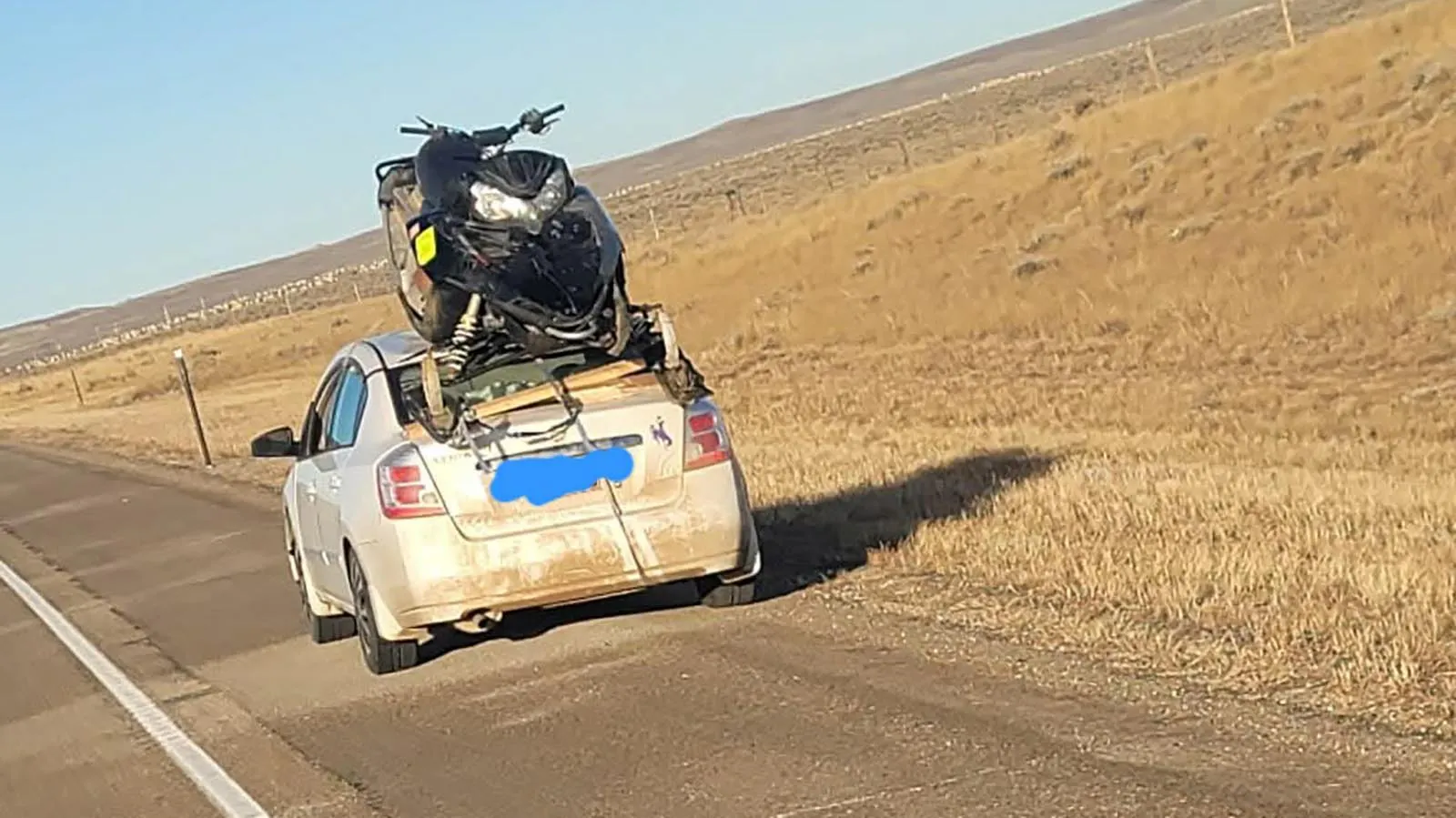 Snowmobile Strapped To A Nissan 'About As Backwoods Redneck As You Can ...
