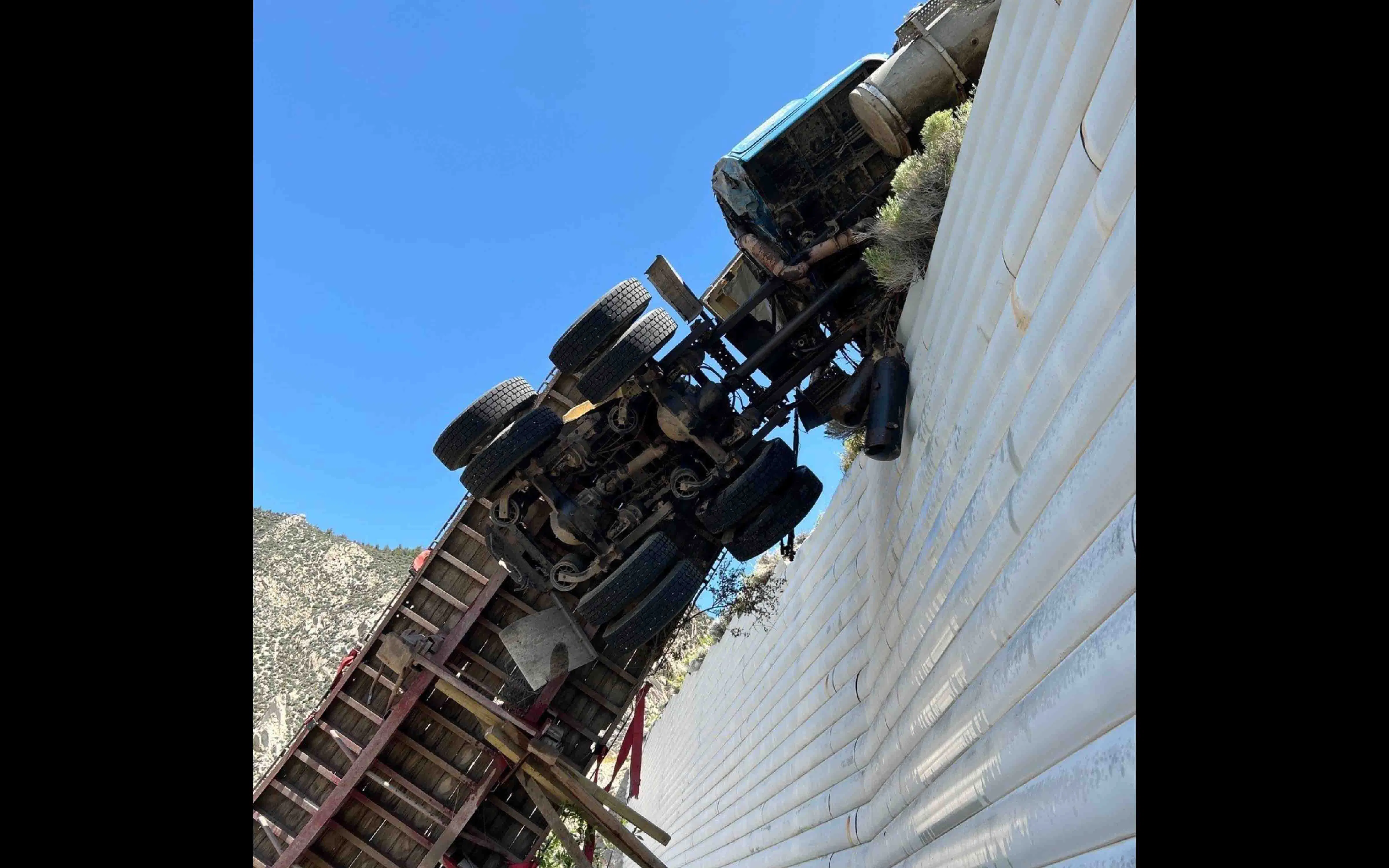 Trucker Survives Accident Which Left Semi Dangling Off Of Cliff On ...